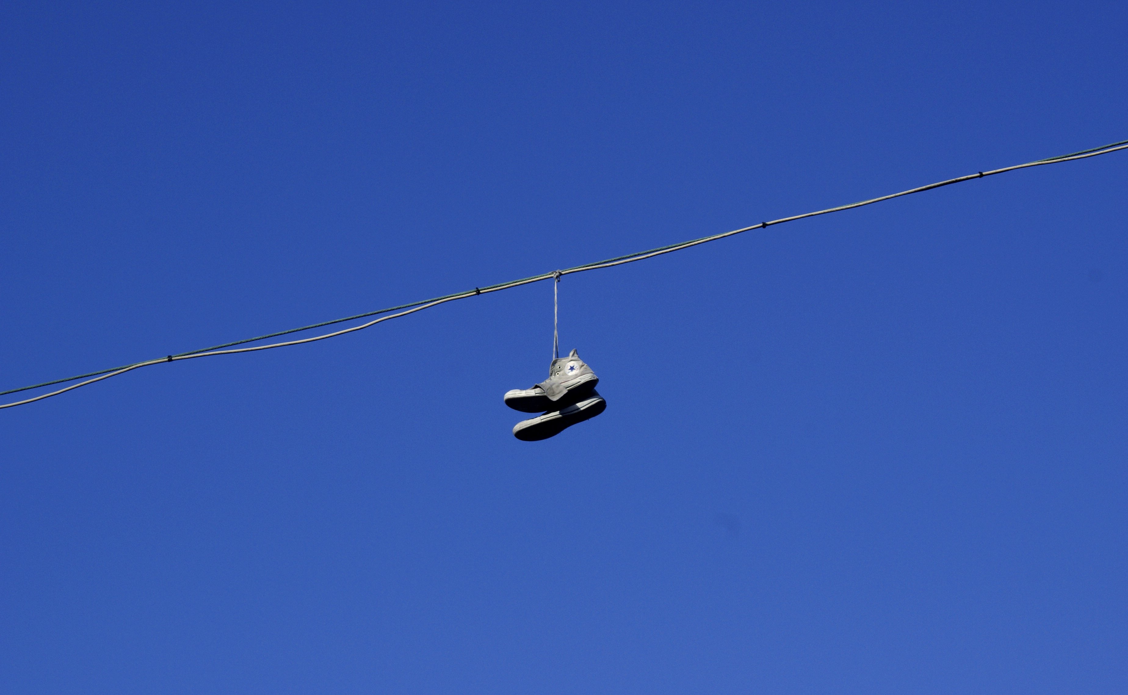 “Why do people throw their shoes on a wire?” | CATERPICKLES